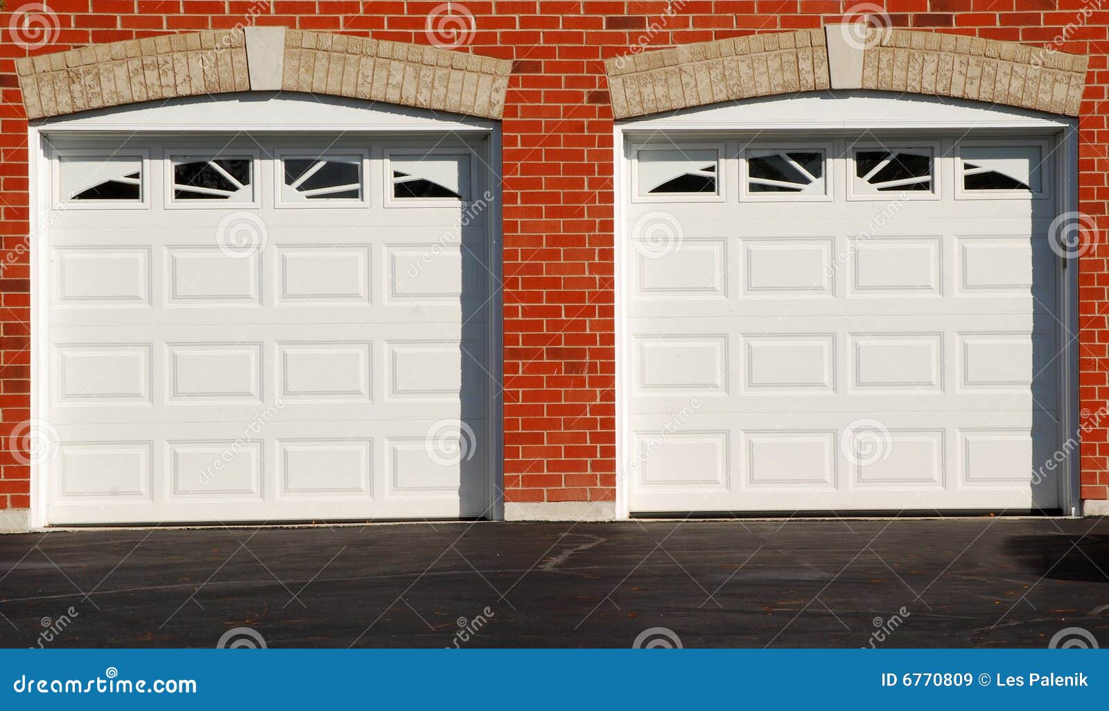 Two Garage Doors stock image. Image of driveway, attached - 6770809