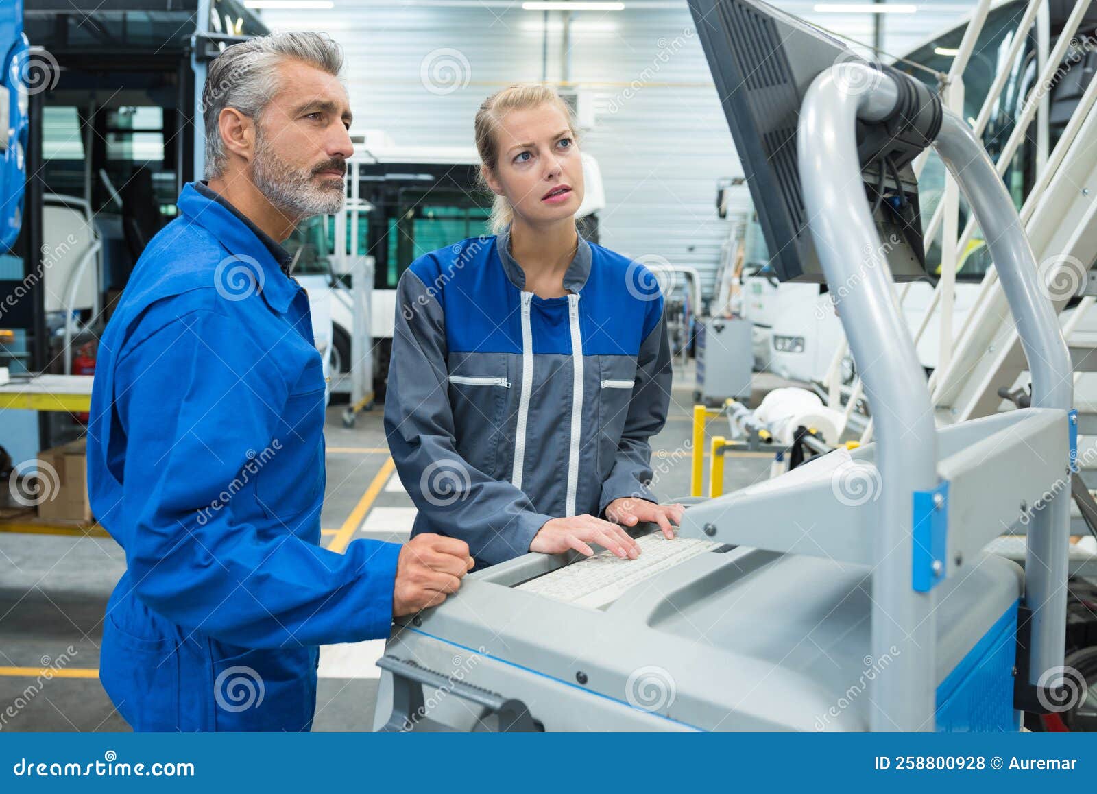 Two Garage Mechanic Working Stock Photo - Image of screwdriver, stylus ...