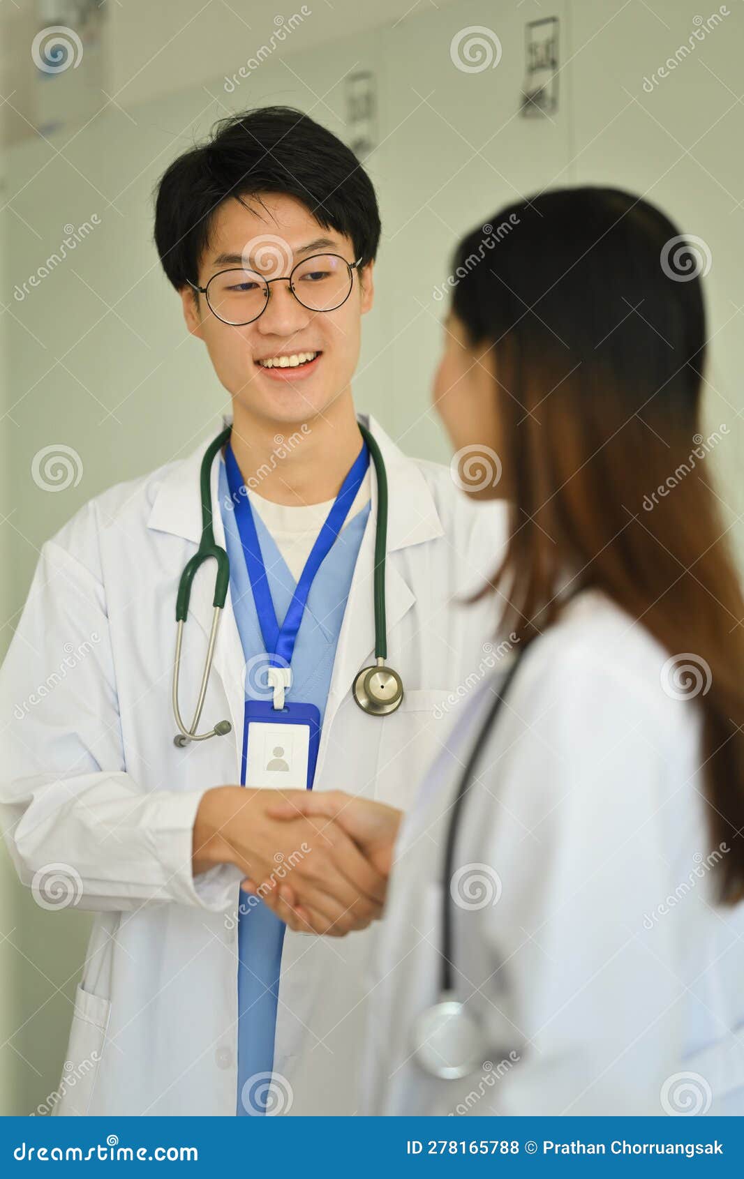 Two General Practitioner in White Uniform and Stethoscope Shaking Hands ...