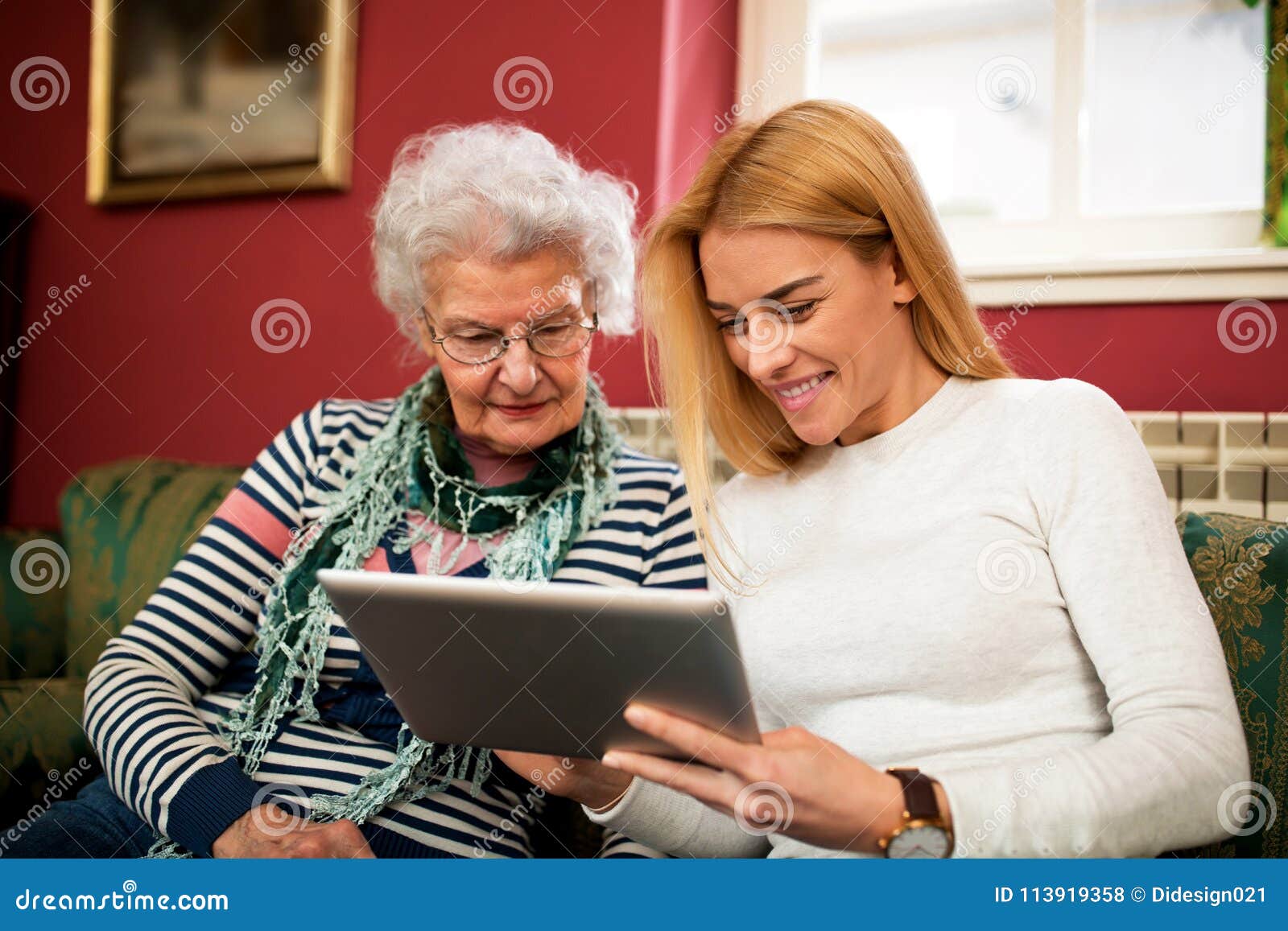Two Generation Using Tablet and Smiling Together Stock Photo - Image of ...