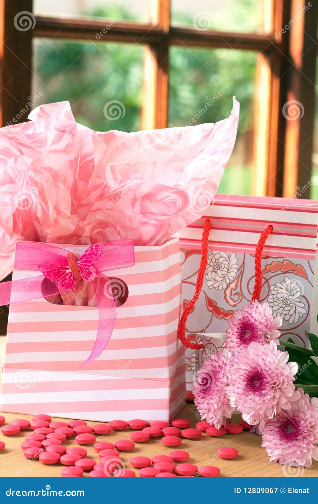 Two Gift Bags with Pink Candy Around Stock Image - Image of giving ...