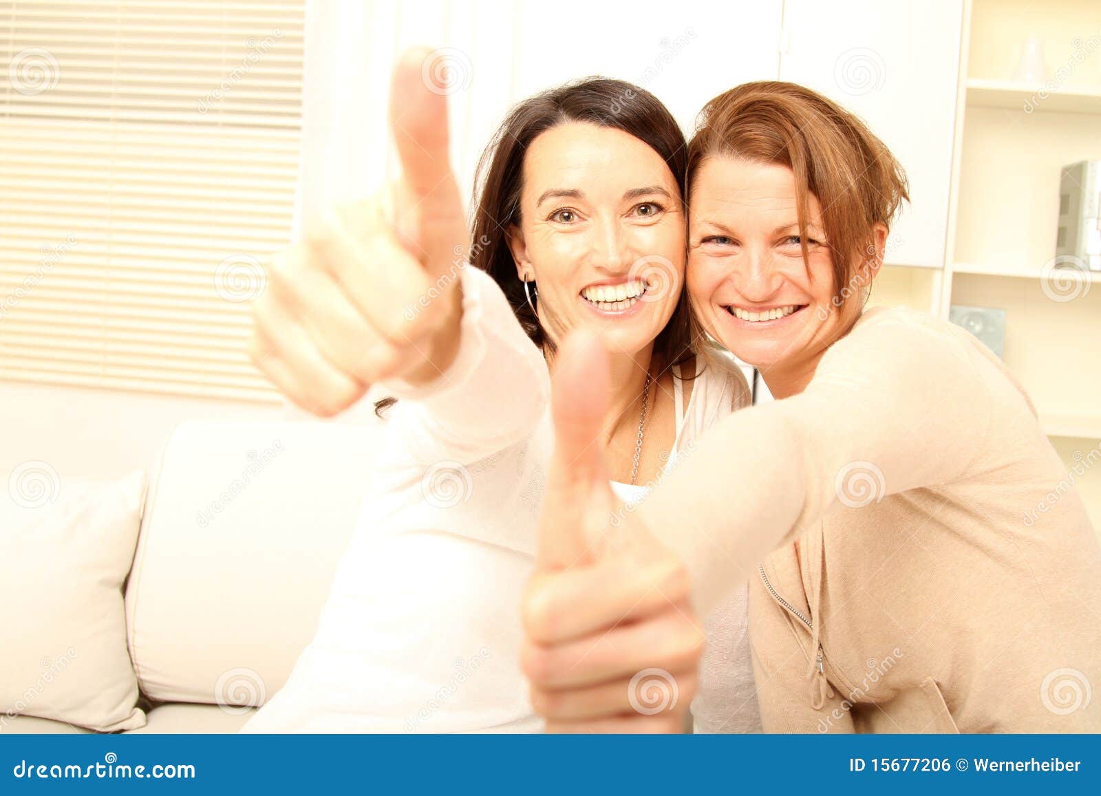 Two Girl Friends Thinking Positive Stock Photo - Image of couch ...