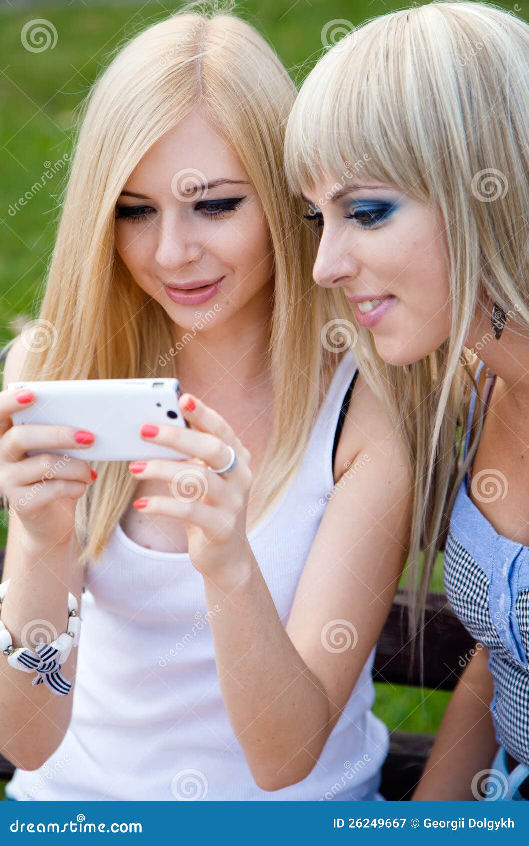 Two Girl Friends Using a Smartphone Stock Image - Image of female ...