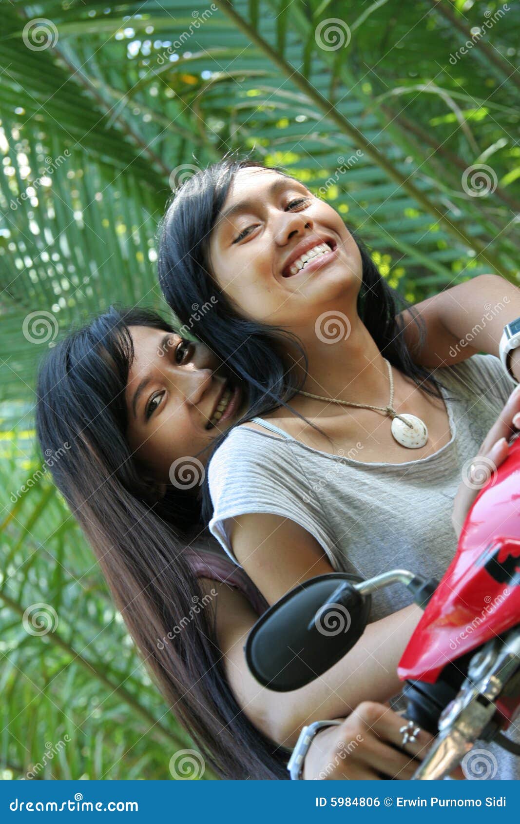 Two Girl Having Fun On Bike Picture. Image: 5984806
