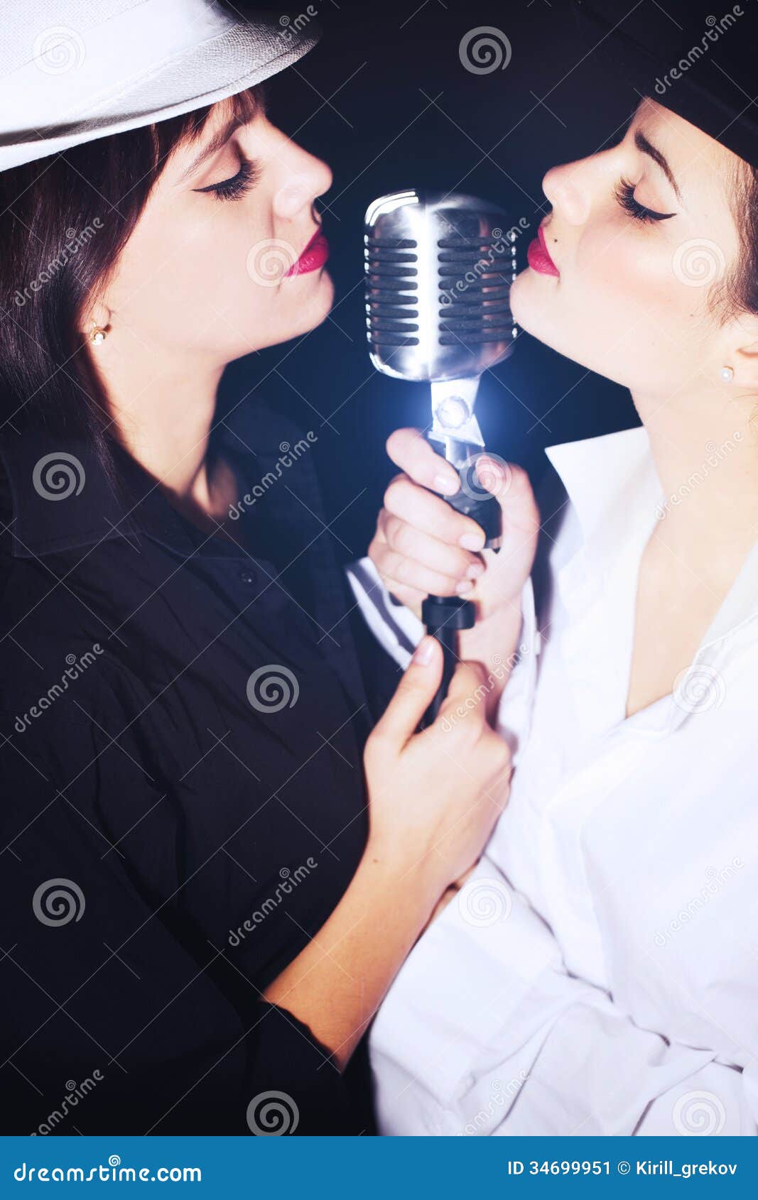 Two girl singers stock image. Image of elegance, beautiful - 34699951