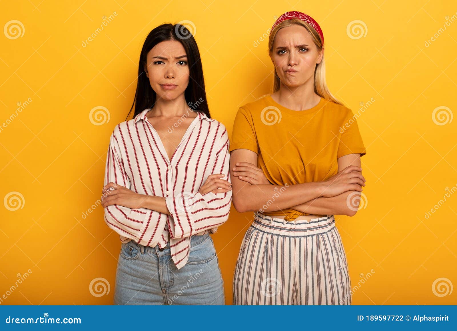 Two Girl with Troubled Expression are Diffident about Something. Yellow ...