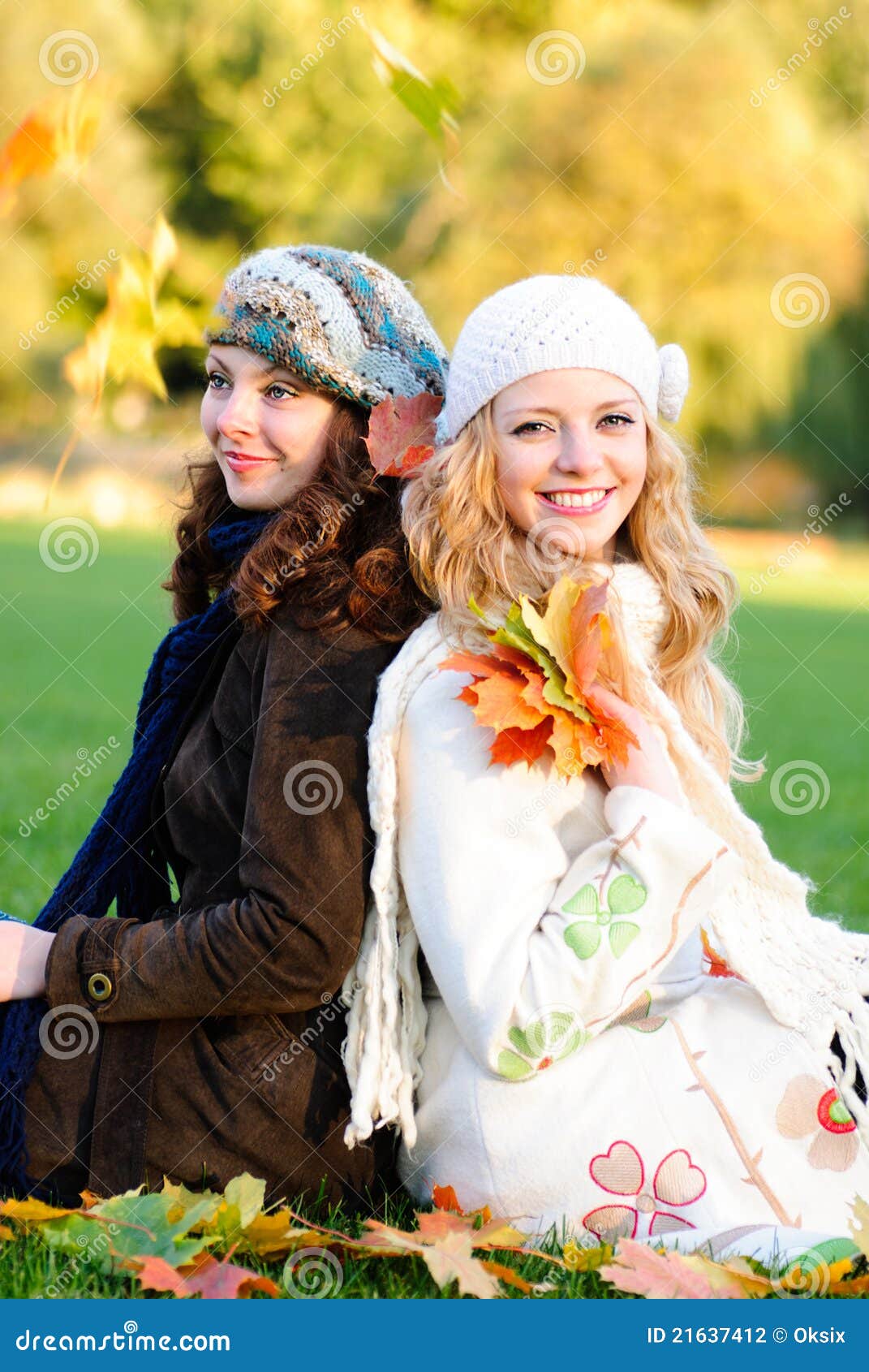 Two girl under the maple stock photo. Image of maple - 21637412
