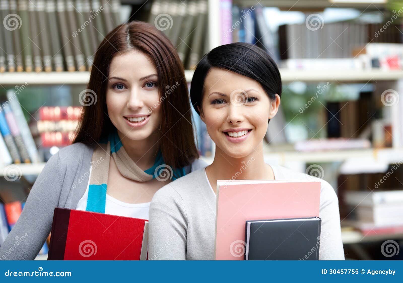 Two Girlfriends with Books at the Library Stock Image - Image of ...