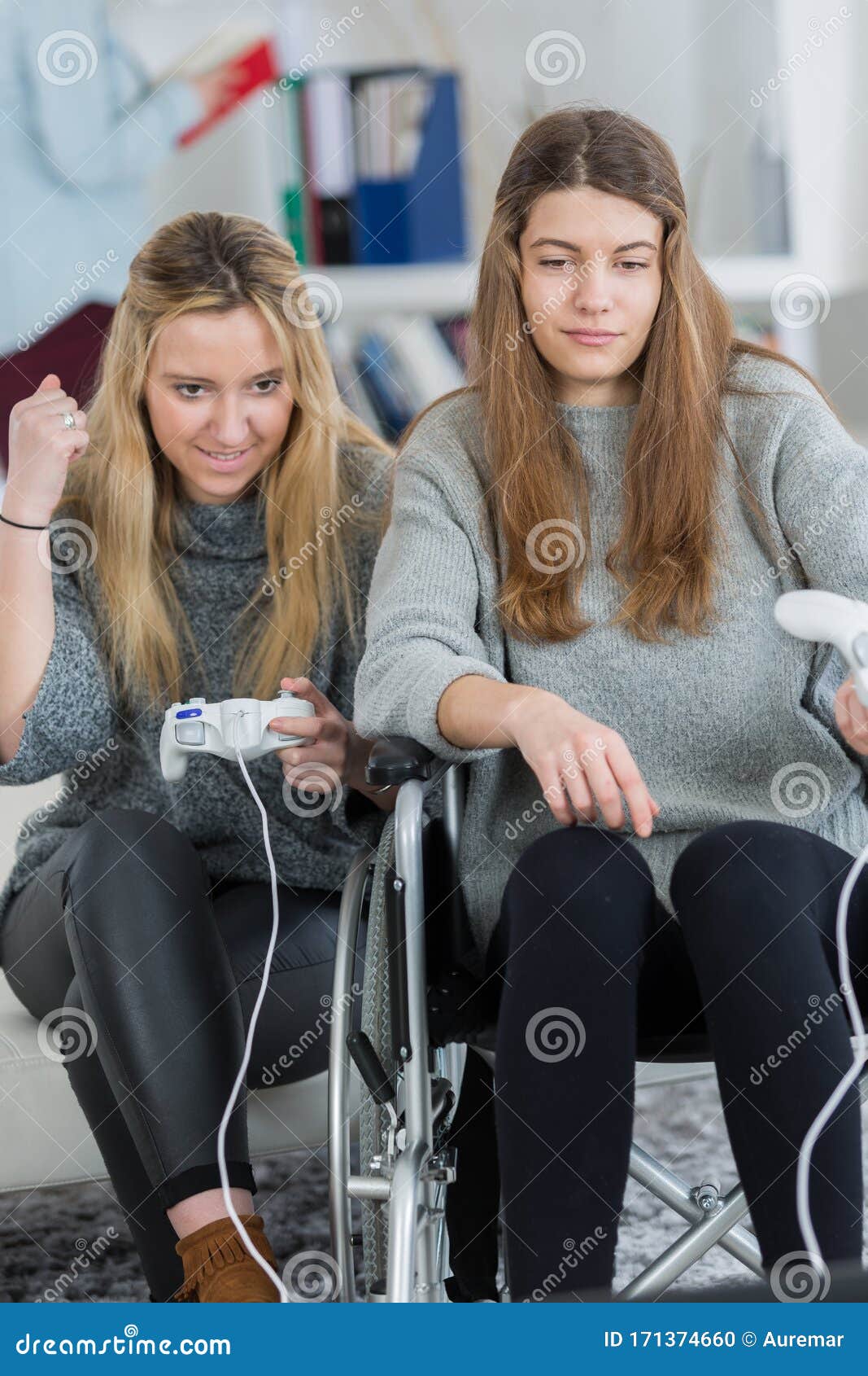 Two Girlfriends Playing Video Games Stock Photo - Image of sofa, sister ...