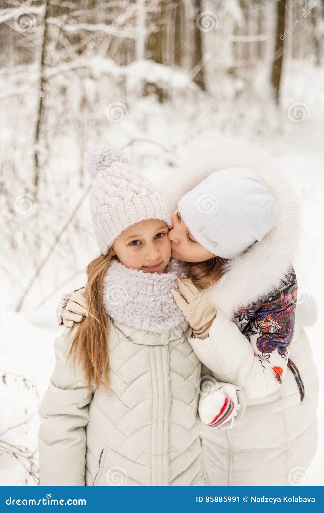 Two Girlfriends Playing in a Winter Forest. Stock Image - Image of ...
