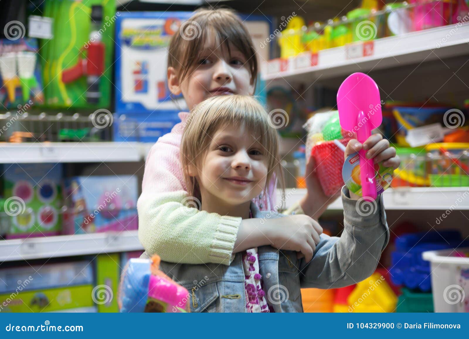 Two Girlfriends in Toy Store Stock Photo - Image of play, shop: 104329900