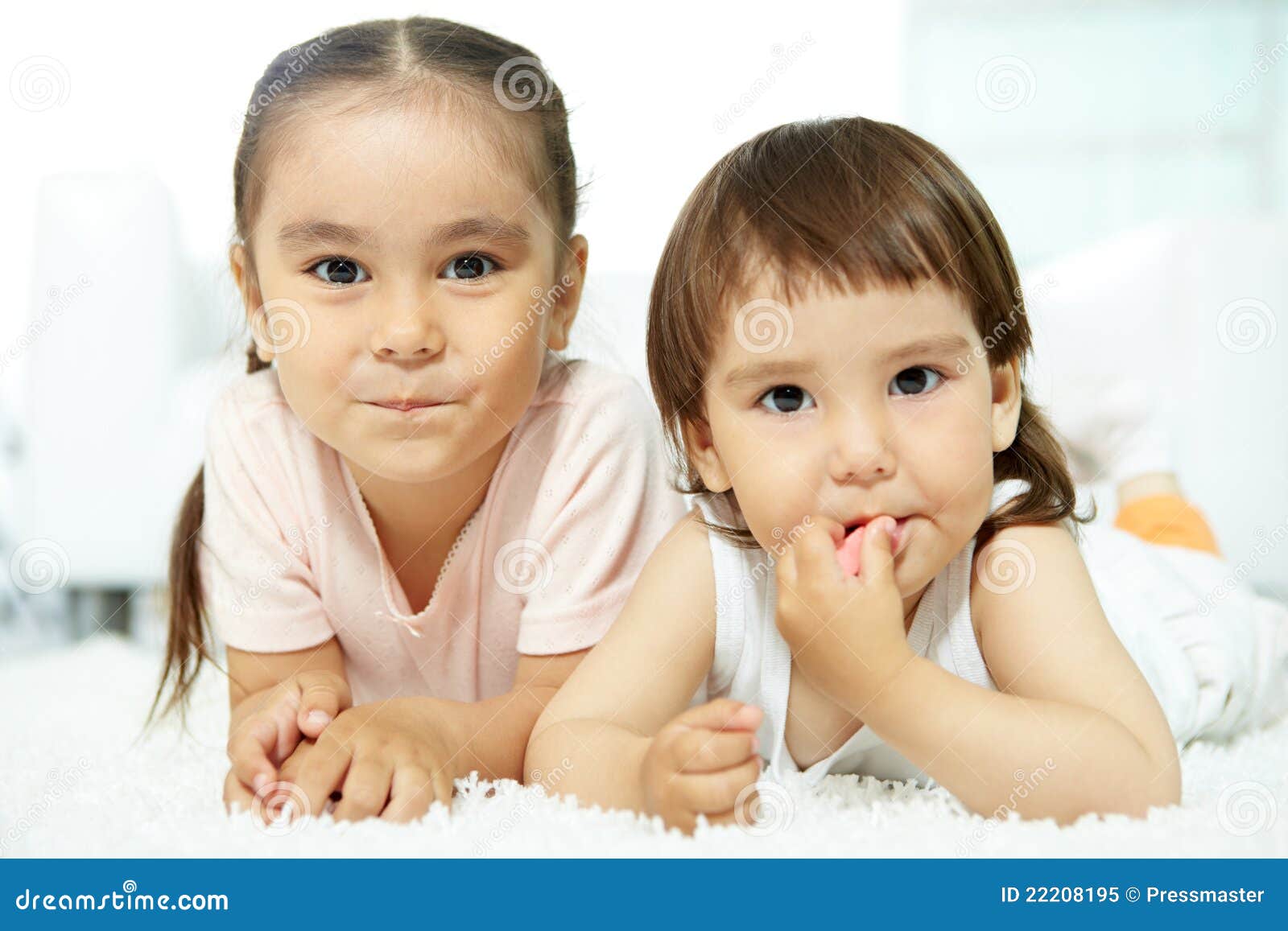 Two girls stock image. Image of looking, preschool, lying - 22208195