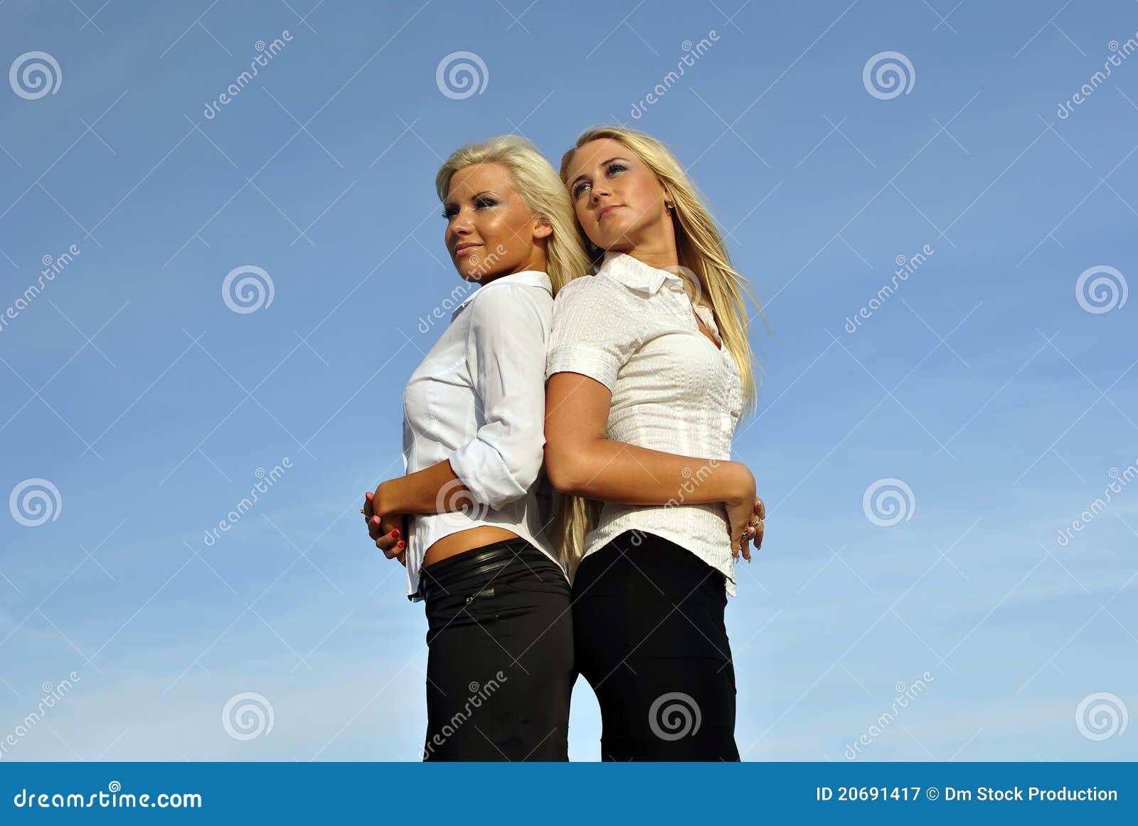 Two Girls Against the Sky. Space for Text Stock Image - Image of couple ...