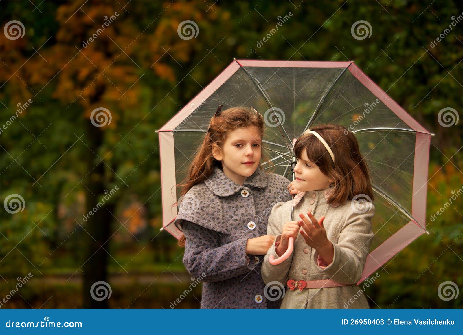 Two girls in autumn park stock image. Image of nature - 26950403