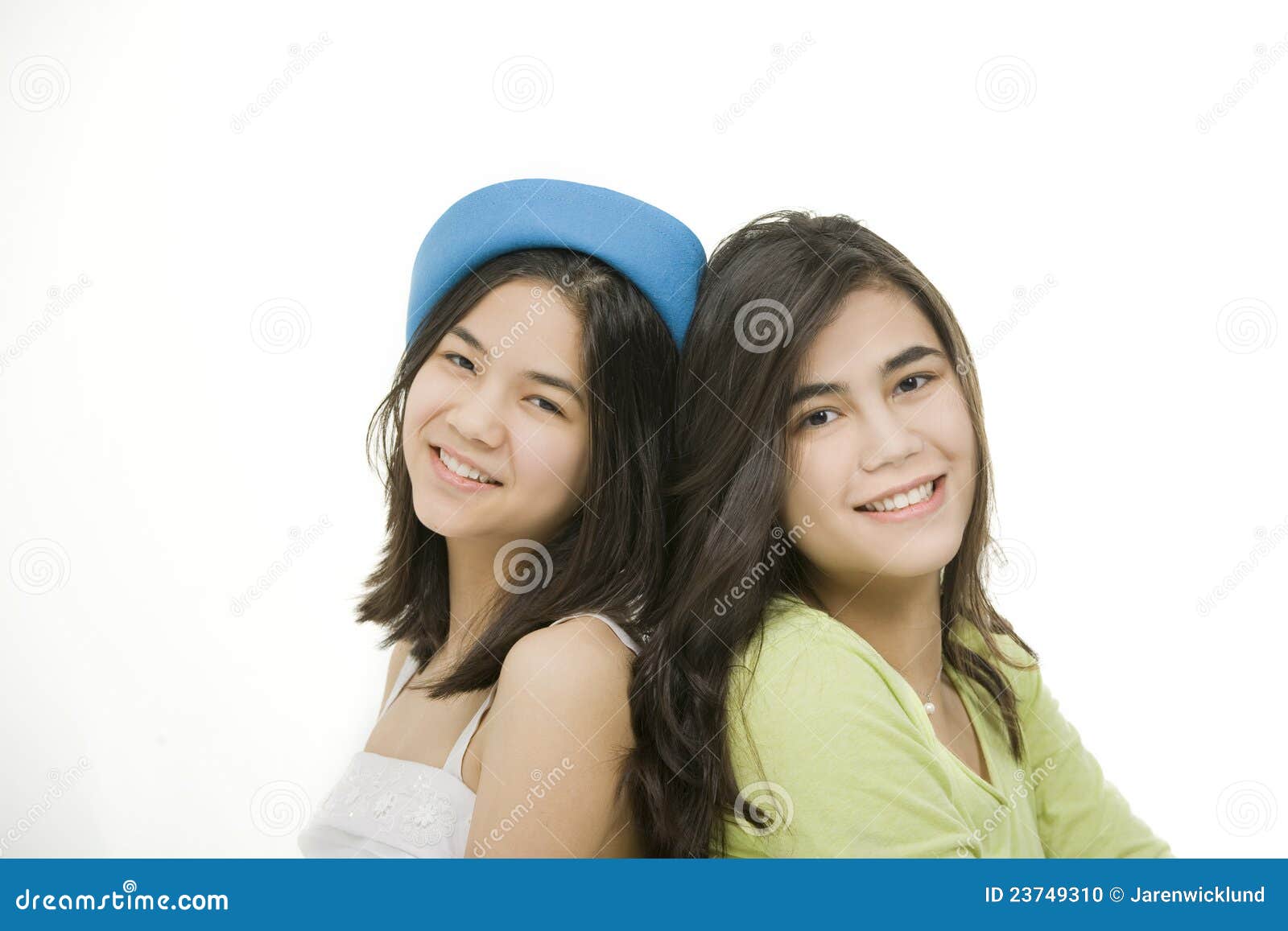 Two Girls Back To Back, Smiling Stock Photo - Image of green ...