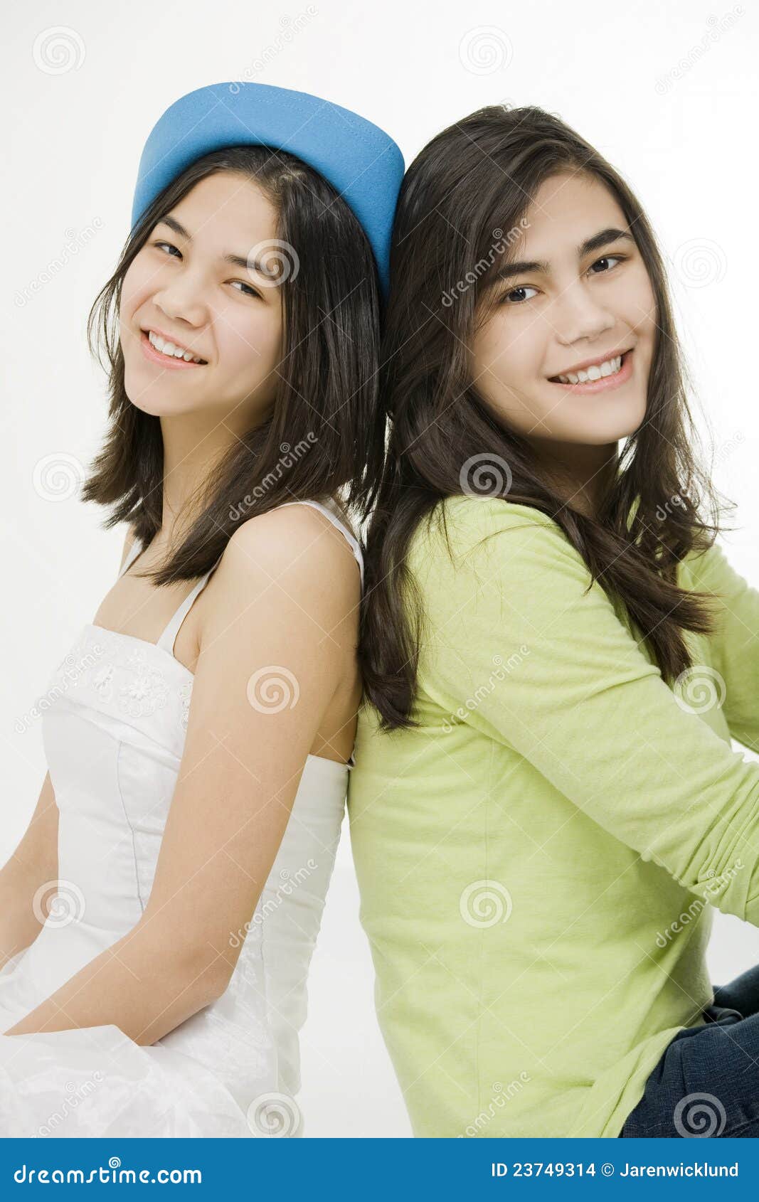 Two Girls Back To Back, Smiling Stock Photo - Image of sitting, teens ...