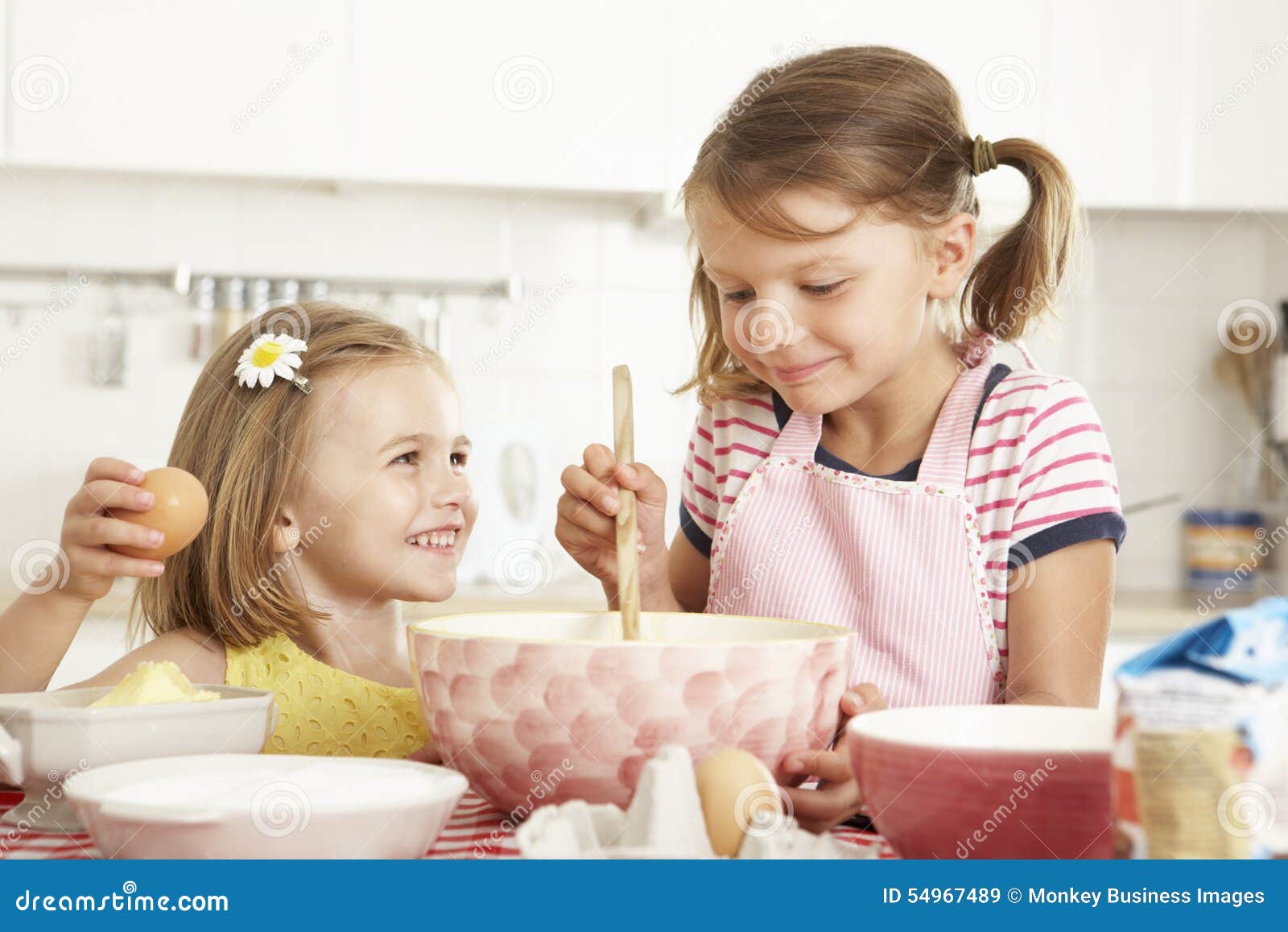 Two Girls Baking in Kitchen Stock Image - Image of ingredients, baker ...