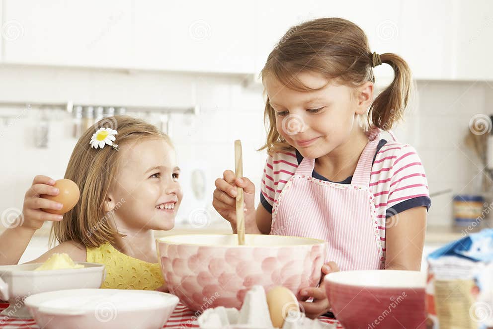 Two Girls Baking in Kitchen Stock Image - Image of ingredients, baker ...