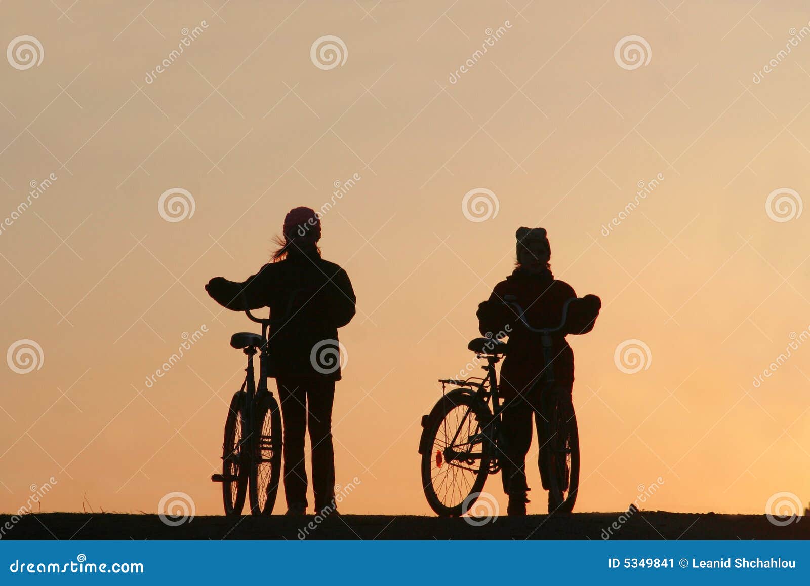 Two girls on bicycles stock image. Image of children, girls - 5349841