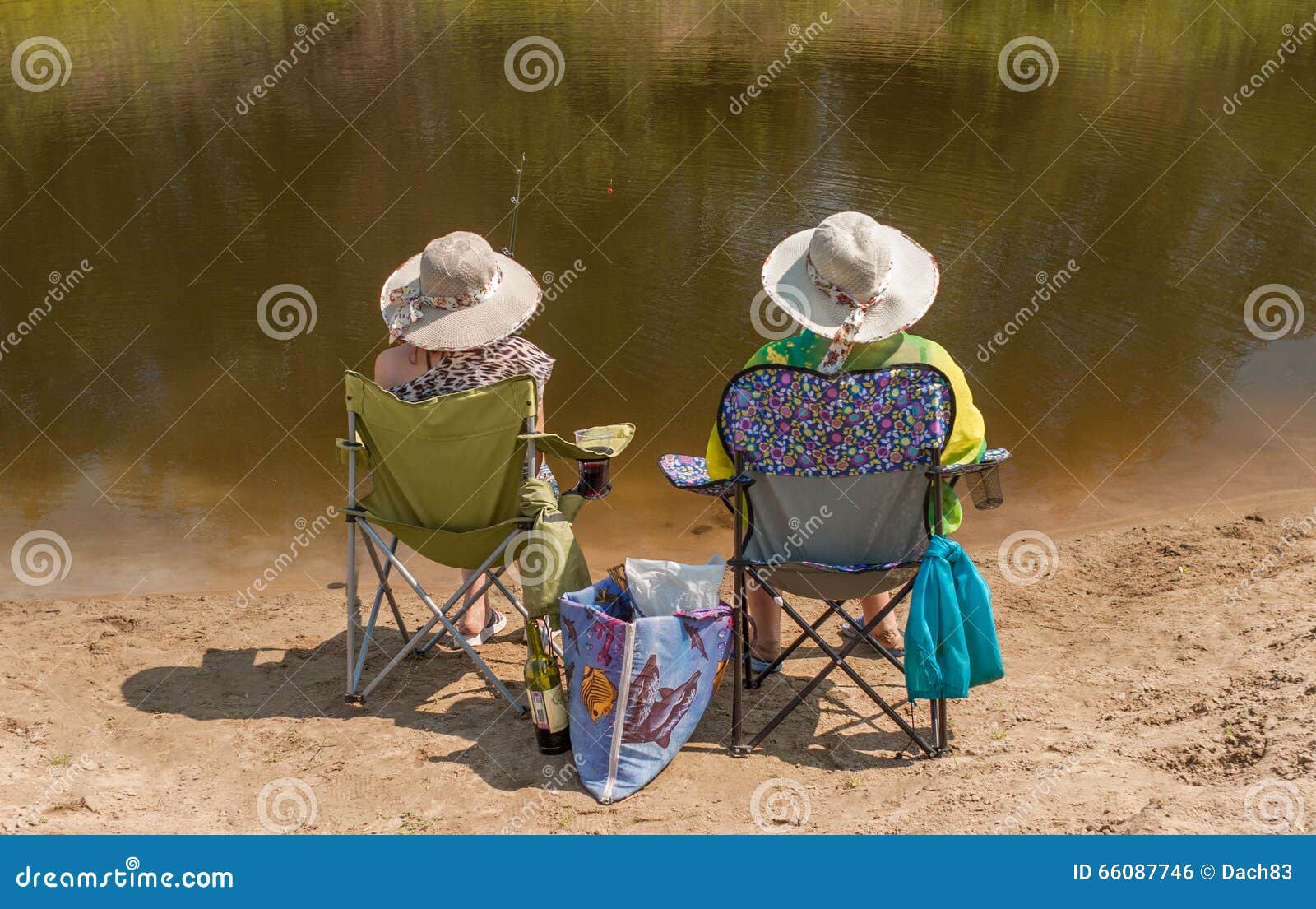 Two girls catch fish stock photo. Image of casting, fishing - 66087746