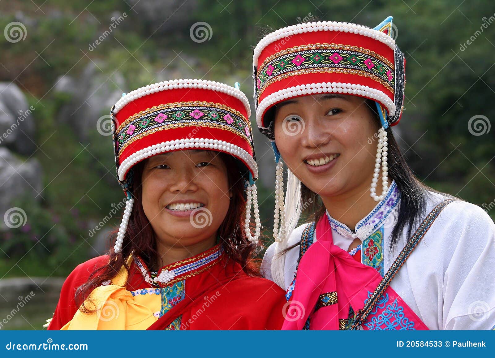 Two girls in China editorial stock photo. Image of caps - 20584533