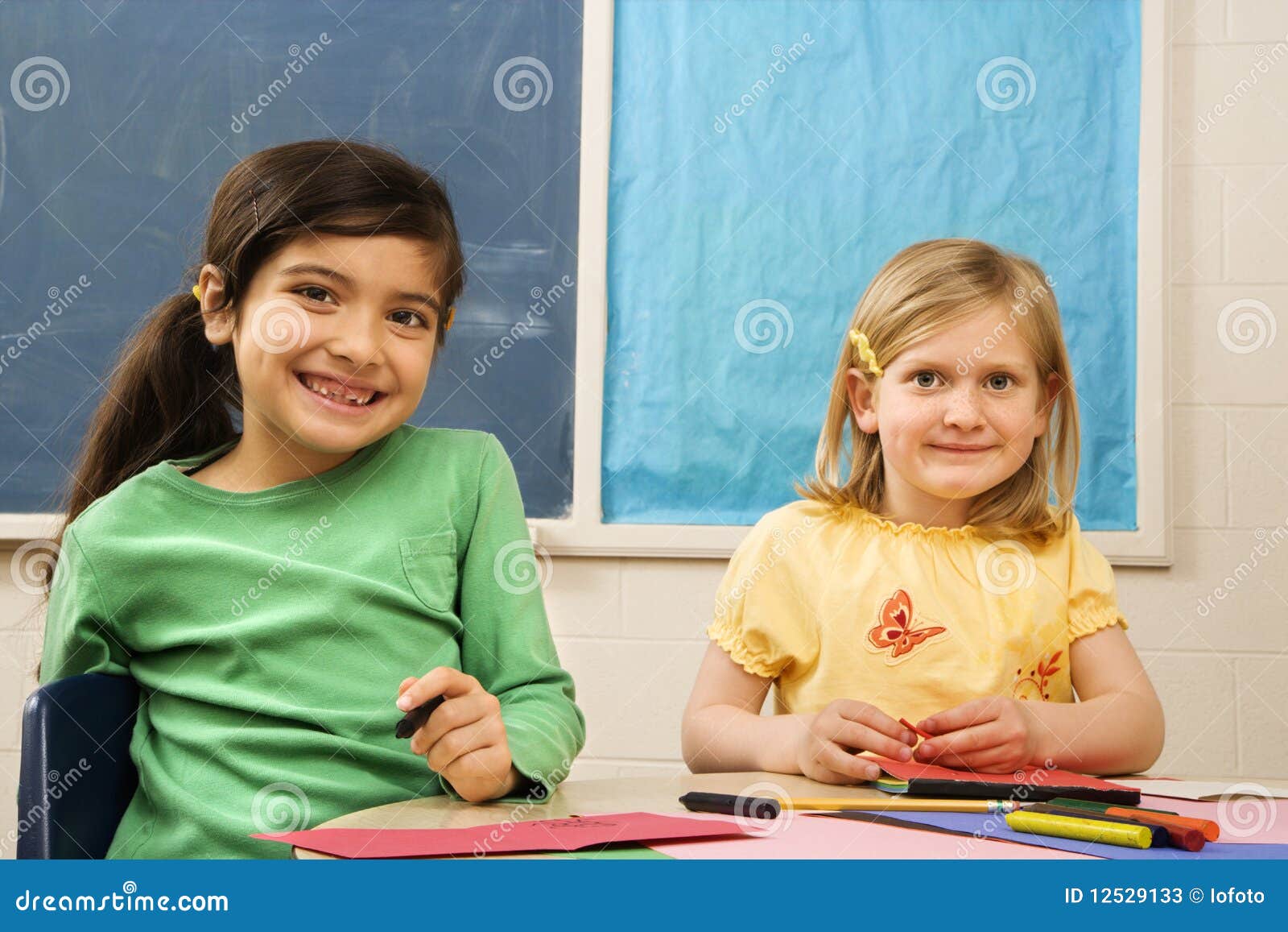 Two Girls in Classroom. stock image. Image of child, looking - 12529133