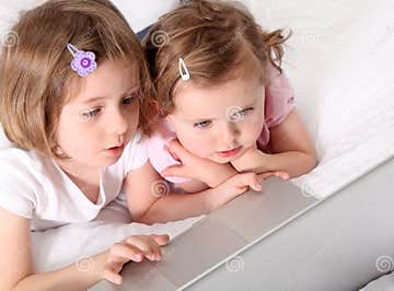 Two girls with computer stock photo. Image of caucasian - 13583014