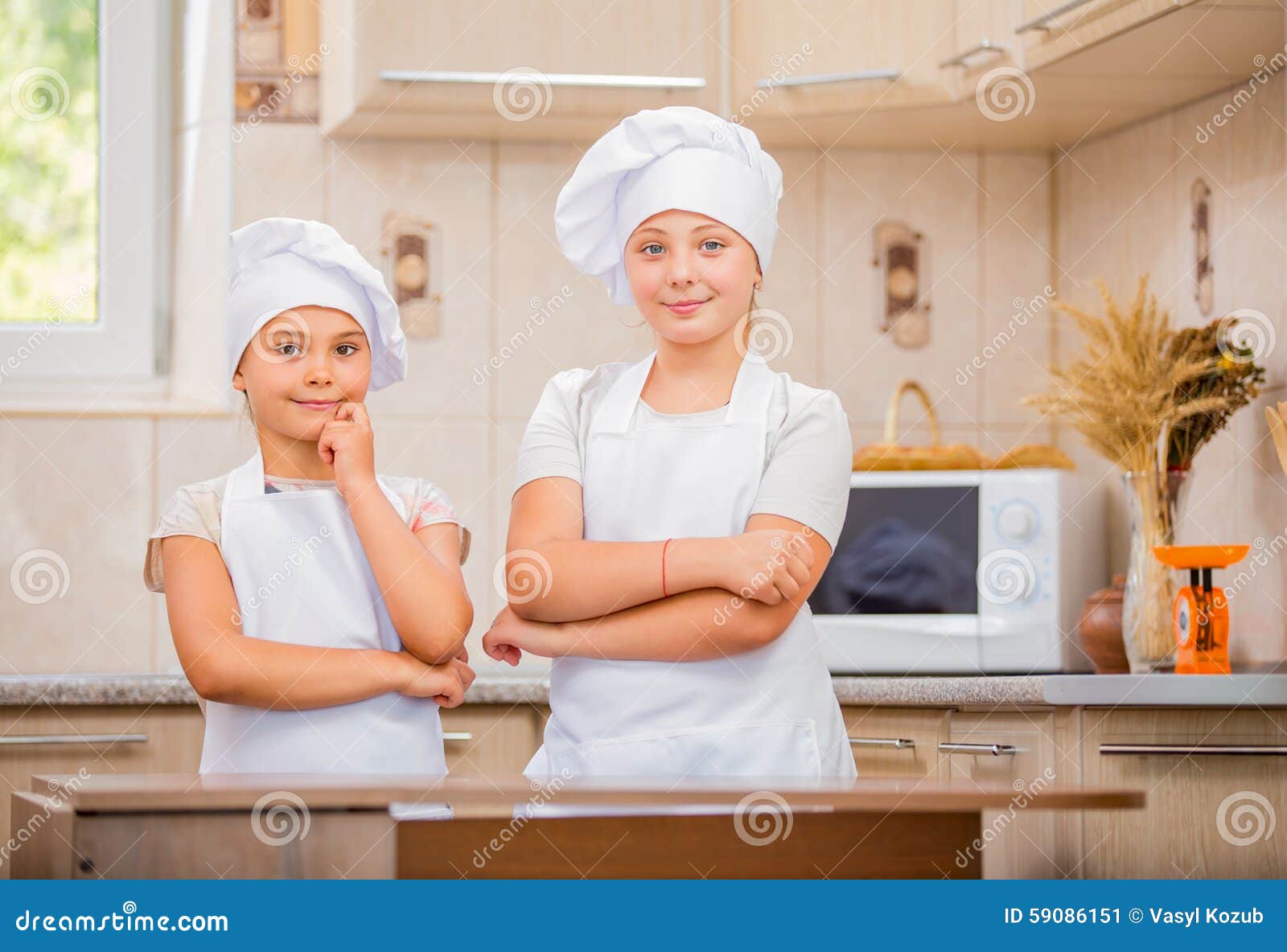 Two girls cook stock image. Image of leisure, female - 59086151