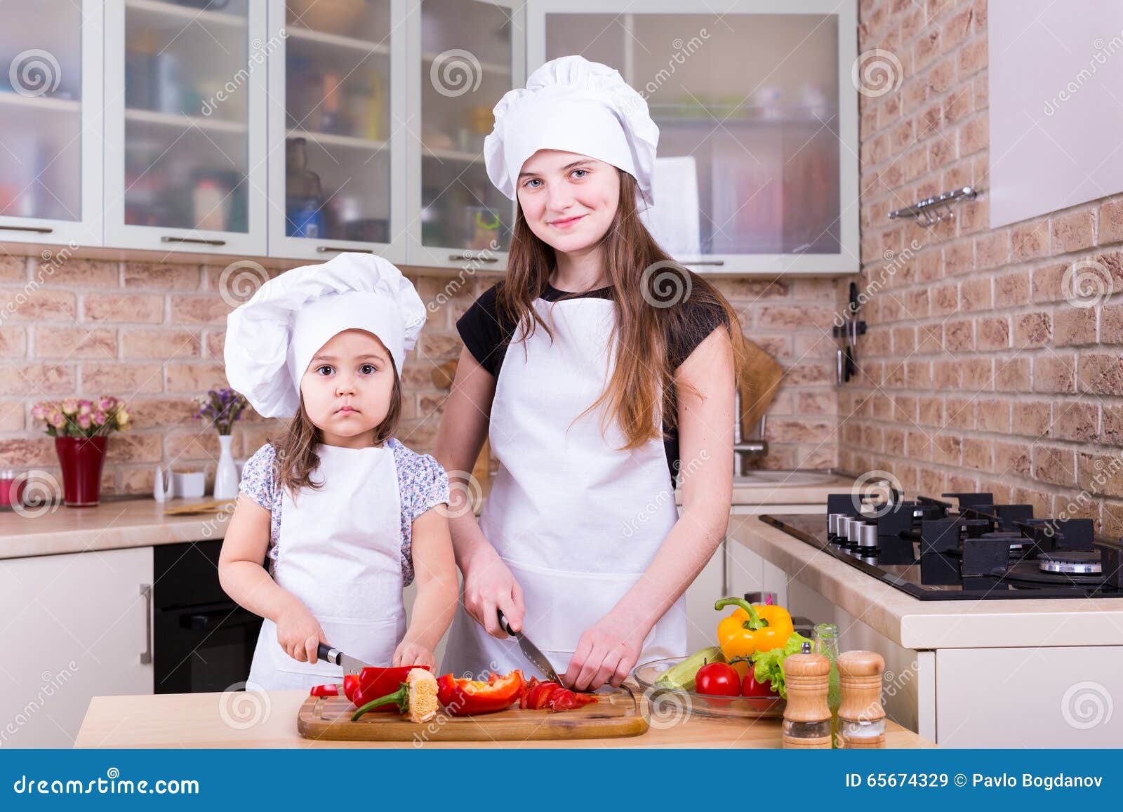 Two Girls Cooking Together at Home Stock Image - Image of home, family ...