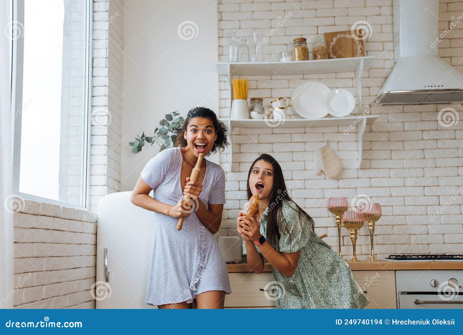 Two Girls of Different Races Having Fun in the Kitchen Stock Photo ...