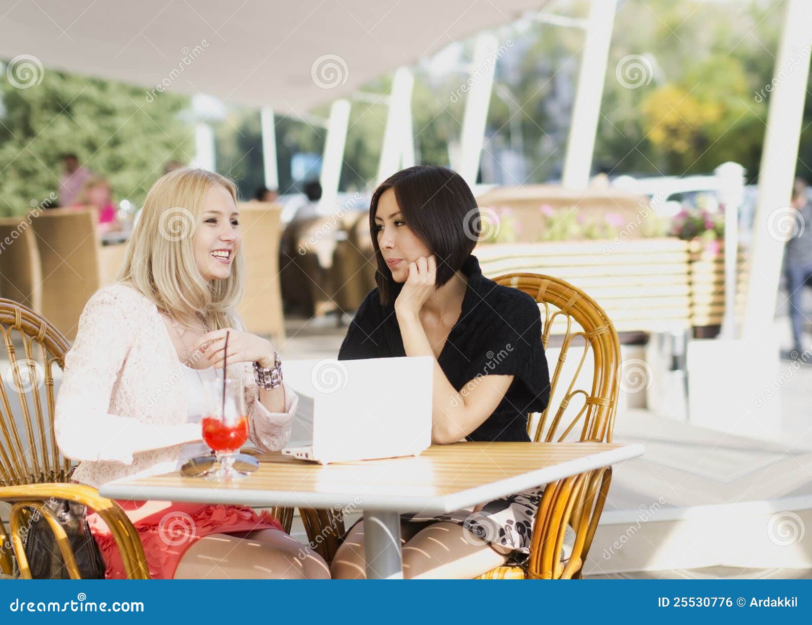 Two girls discussing stock photo. Image of beautiful - 25530776