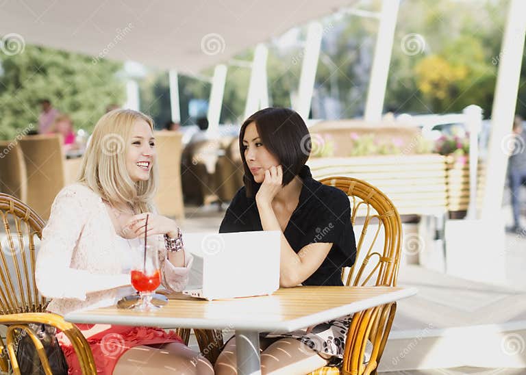 Two girls discussing stock photo. Image of beautiful - 25530776