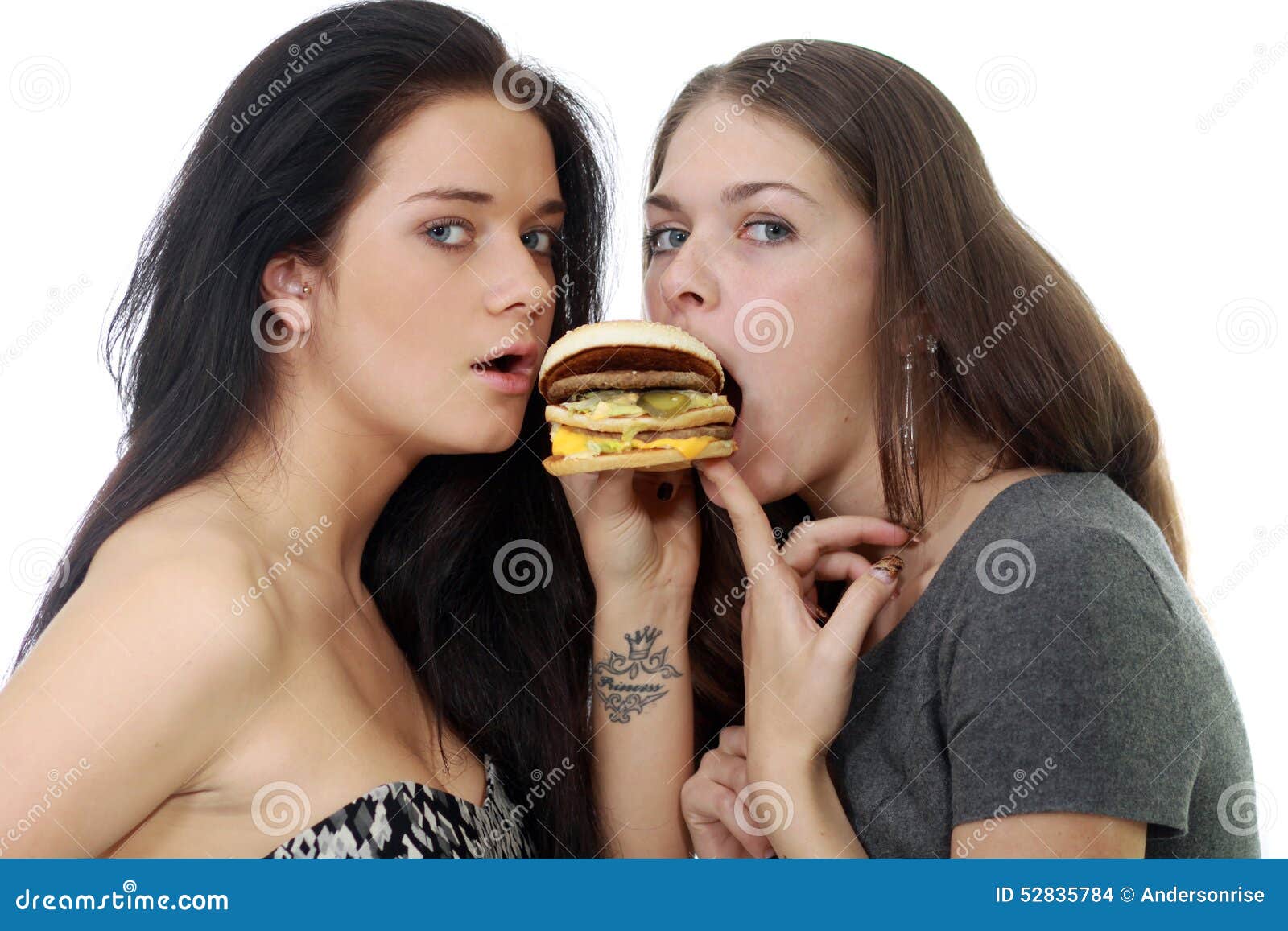 Two Girls Divide One Sandwich Stock Photo - Image of face, beauty: 52835784