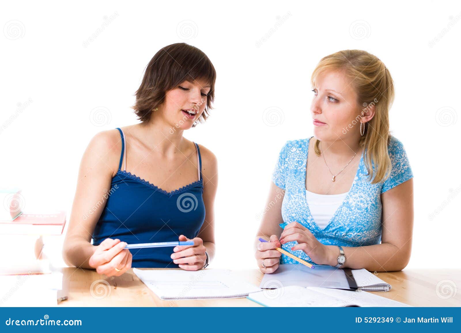 Two Girls doing Homework stock image. Image of table, blonde - 5292349