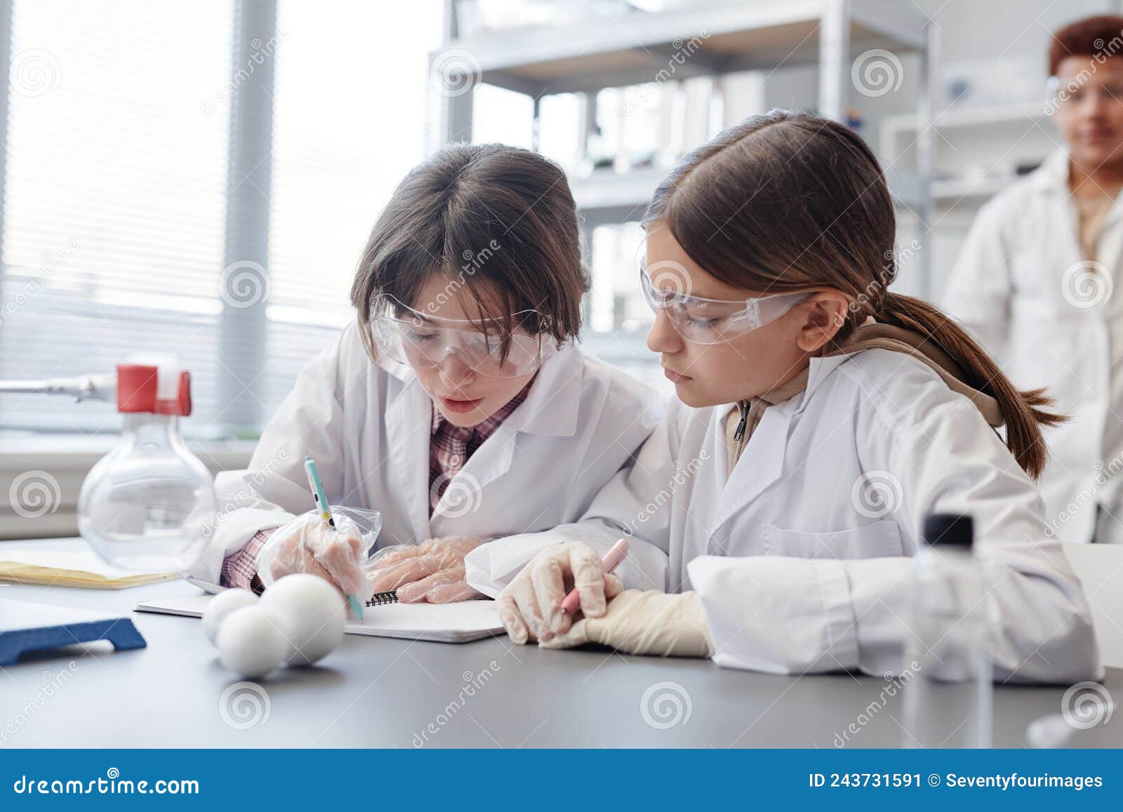 Two Girls Doing Practice Experiment in School Laboratory Stock Image ...
