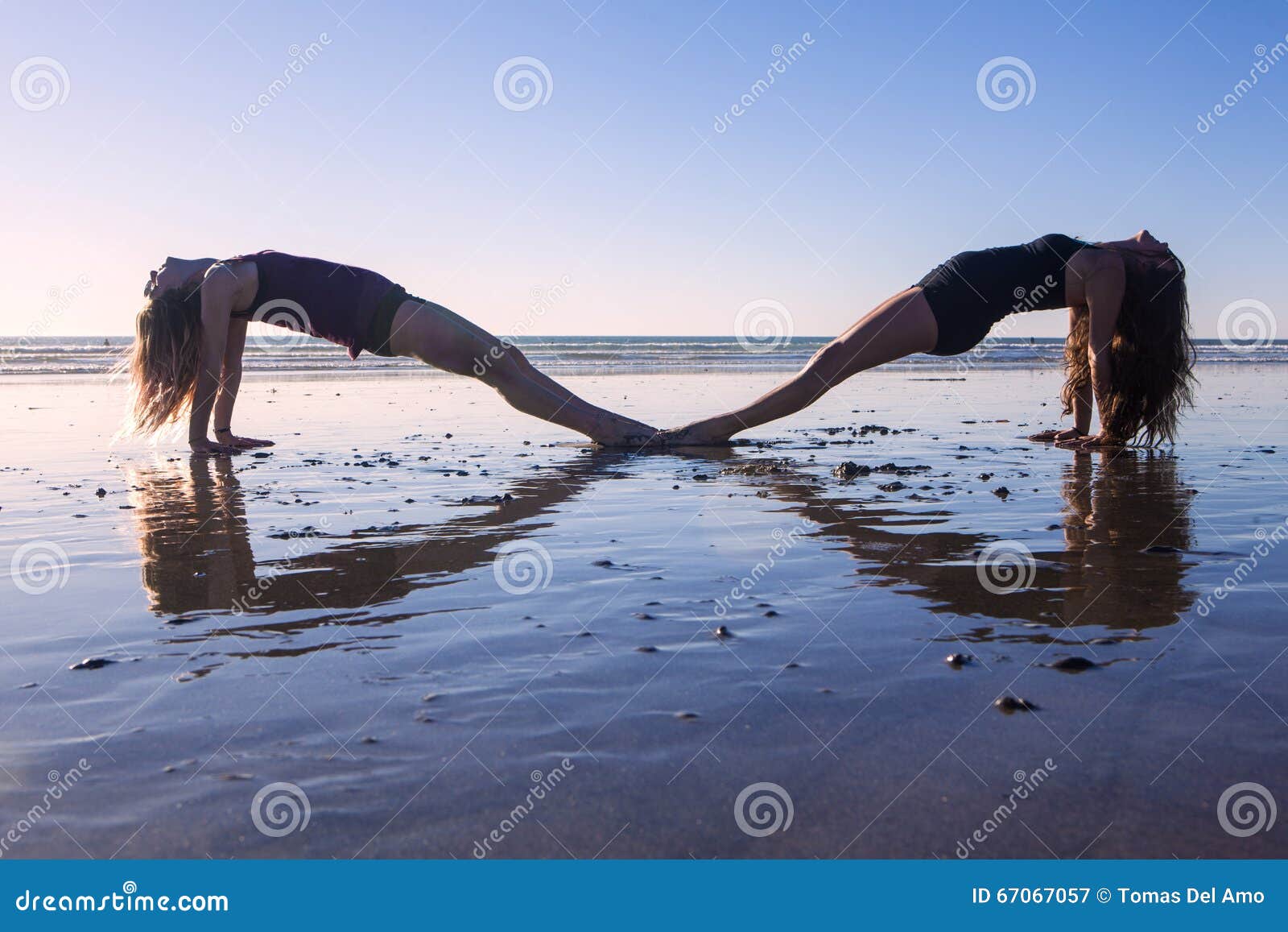 Two girls doing yoga stock image. Image of women, yoga - 67067057