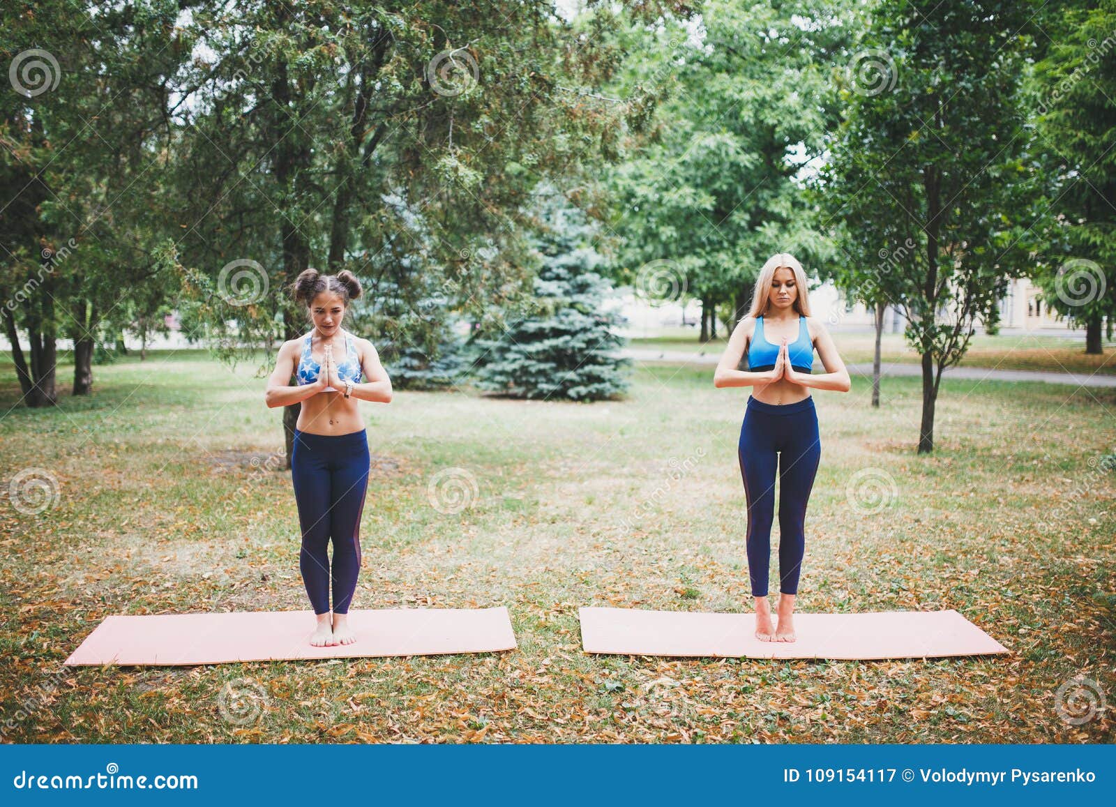 Two Girls Doing Yoga Outdoors. Stock Image - Image of healthy, fitness ...