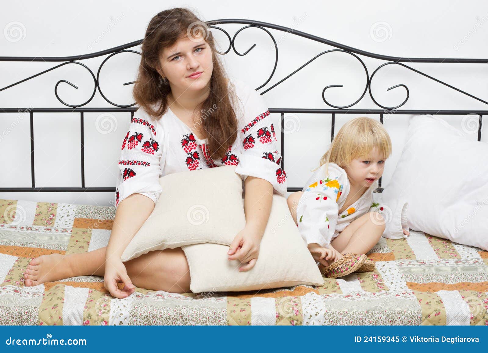 Two Girls Dressed in Ukrainian on the Bed Stock Image - Image of ...