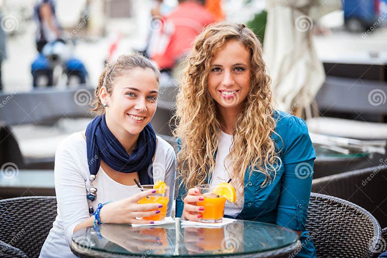 Two Girls Drinking stock photo. Image of couples, caucasian - 28425702
