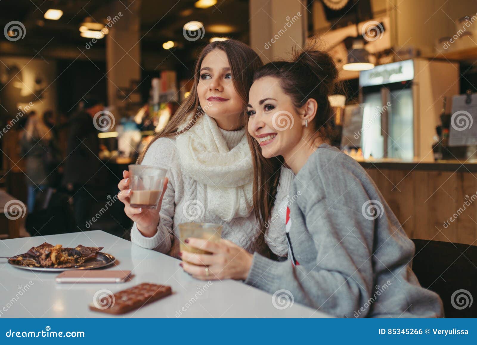 Two Girls Drinking Coffee in Cafe Stock Photo - Image of leisure ...