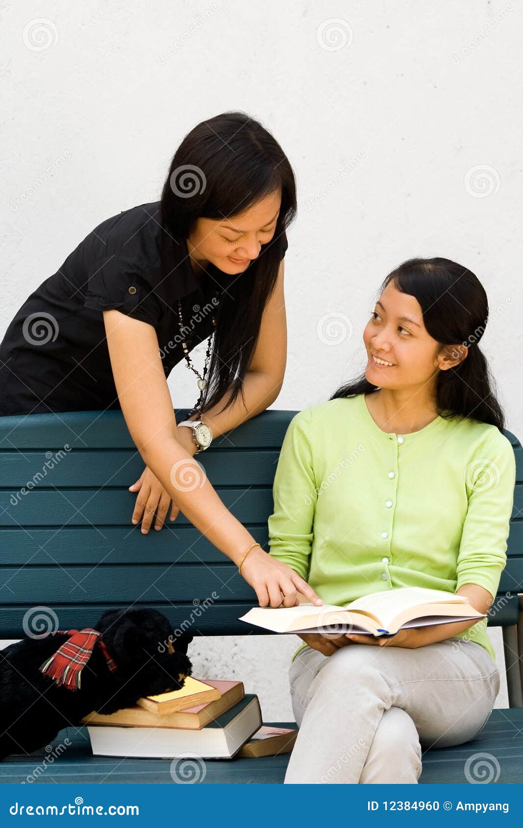 Two Girls Enjoy Discussing a Book Stock Photo - Image of enjoy ...