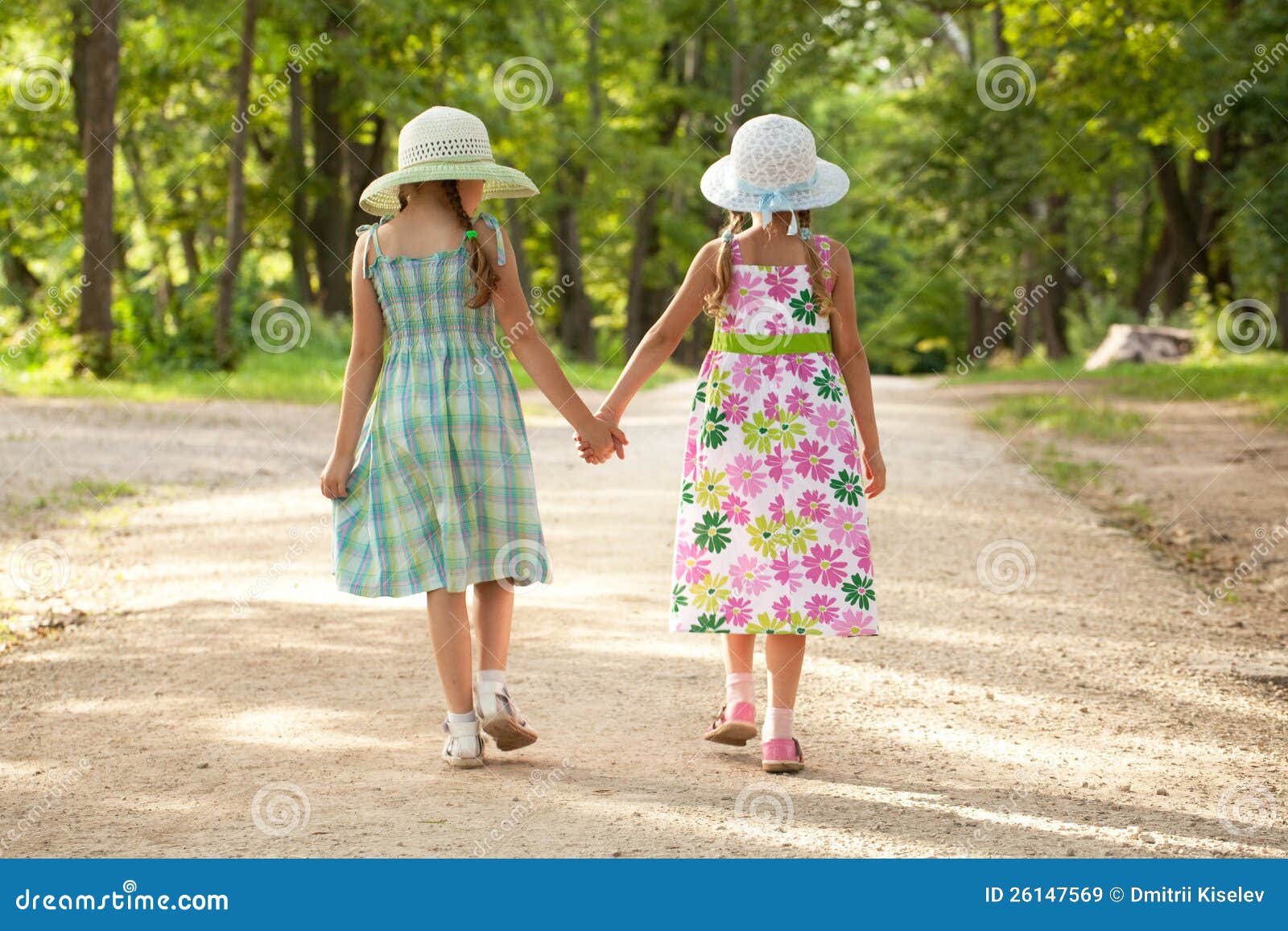 Two girls go hand in hand stock image. Image of nature - 26147569
