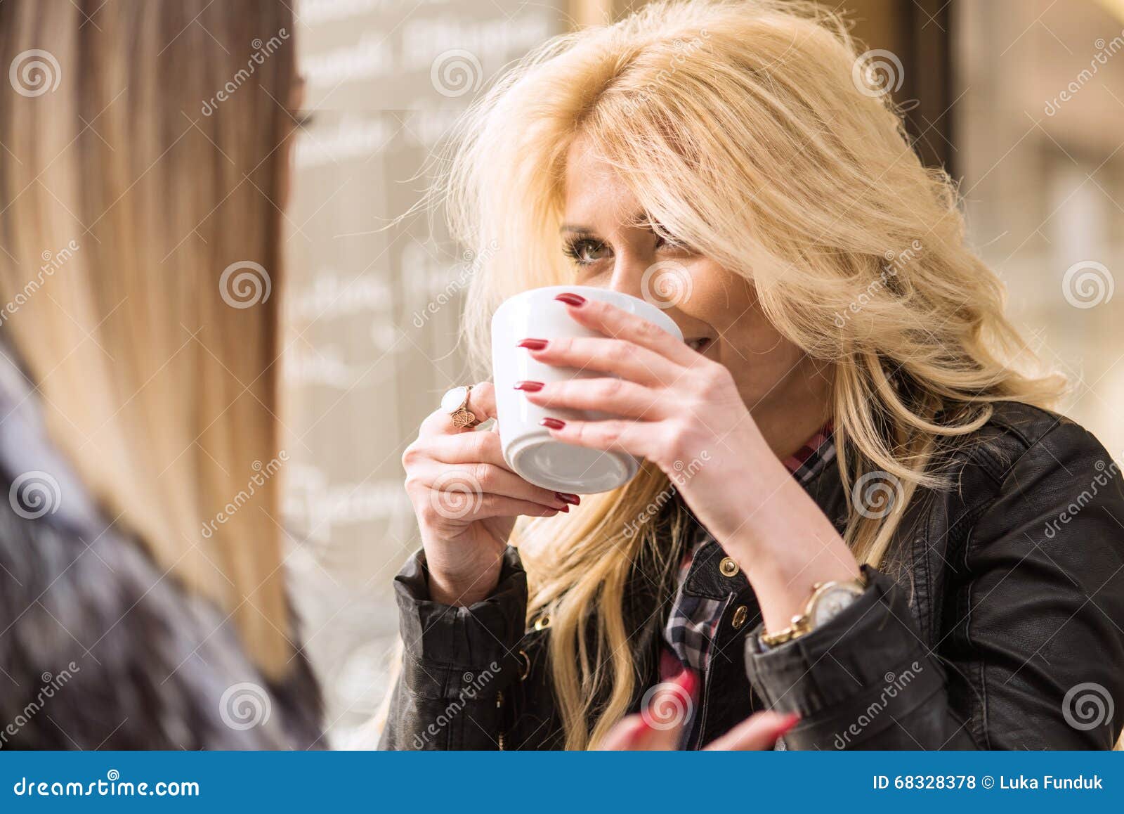 Two Girls Having Fun while Drinking Coffee Stock Photo - Image of ...