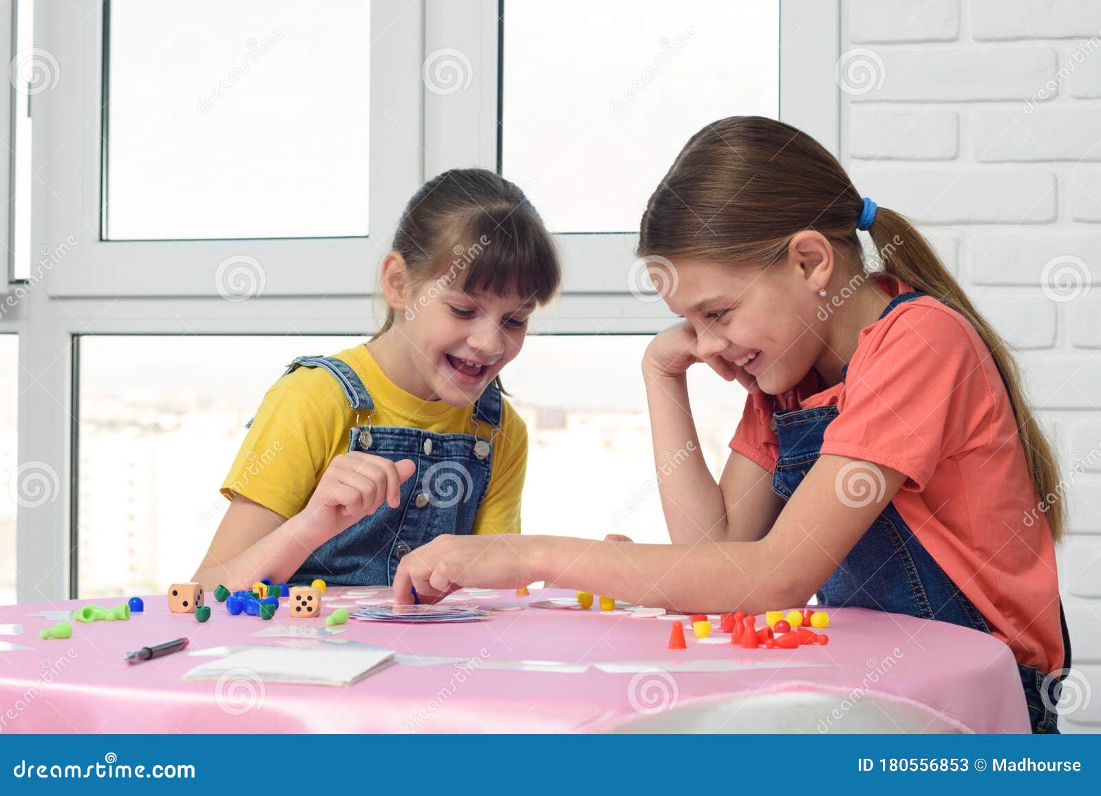 Two Girls Having Fun Playing a Board Game Stock Image - Image of ...