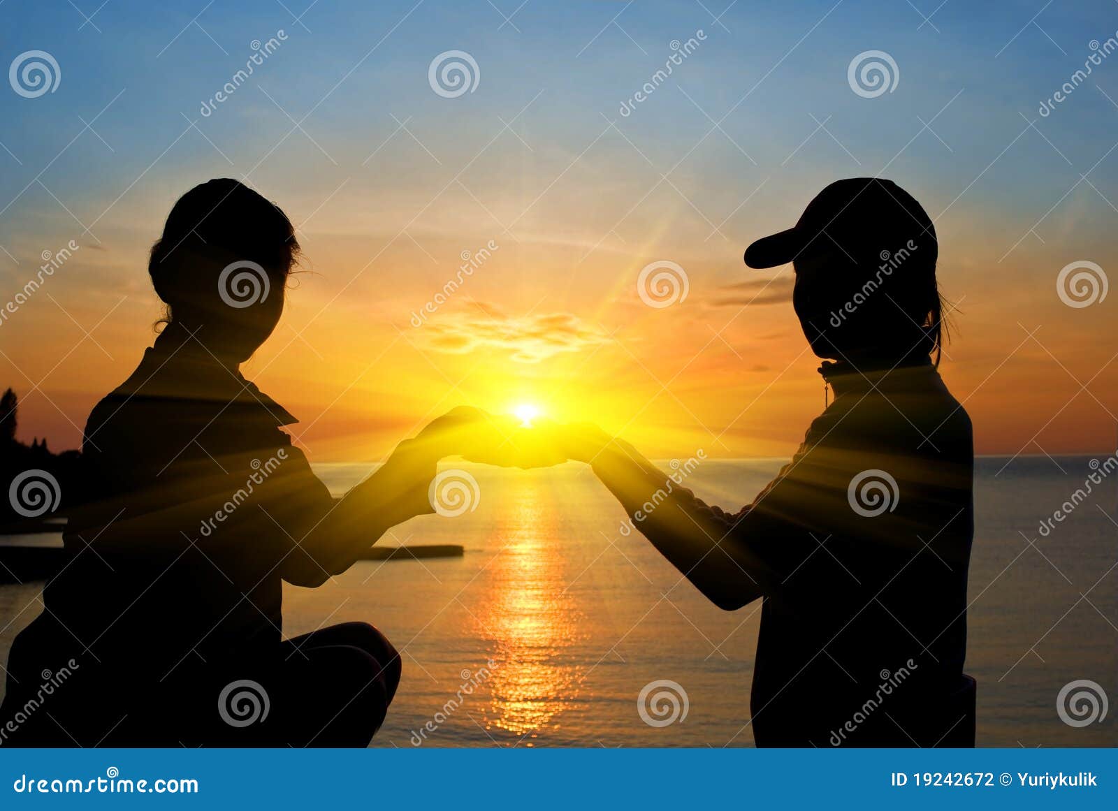 Two girls holding a sun stock photo. Image of beautiful - 19242672