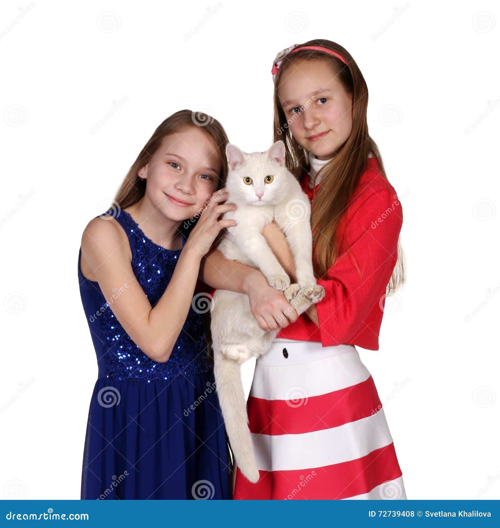 Two girls hugging cat stock photo. Image of happiness - 72739408