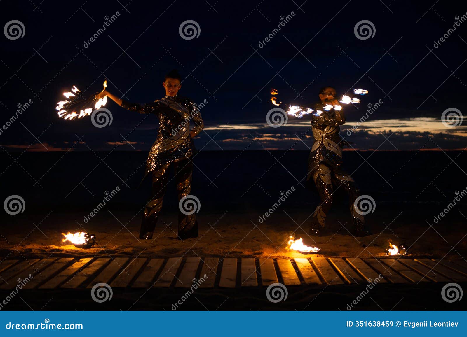 Two Girls Light a Sparkler on the Beach at Dusk Stock Image - Image of ...
