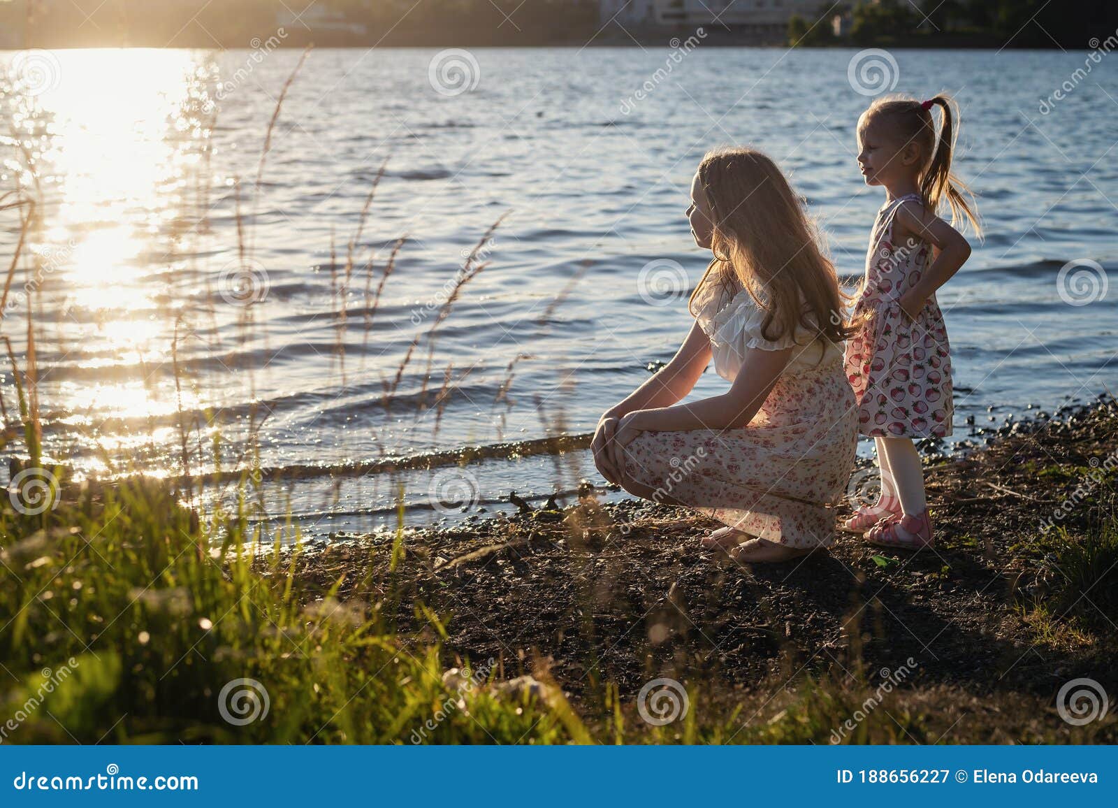 Two Girls Look into the Distance on the Shore Stock Image - Image of ...