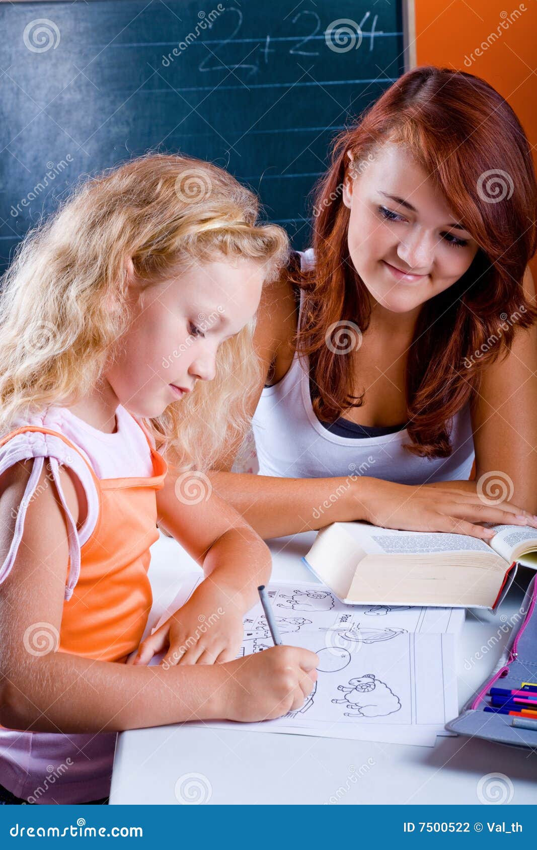 Two girls making homework stock photo. Image of teaching - 7500522
