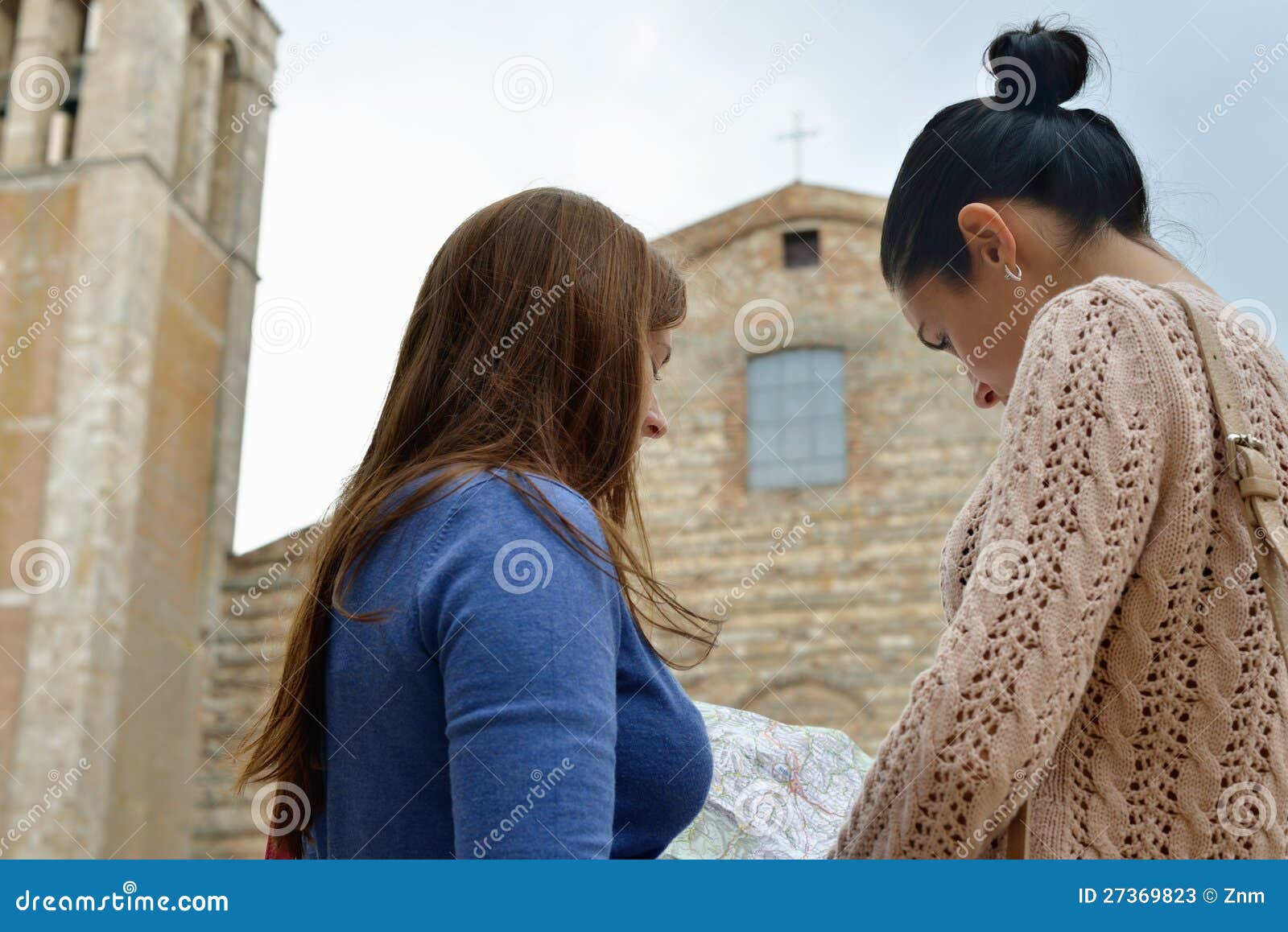 Two girls with map stock image. Image of pretty, vacation - 27369823